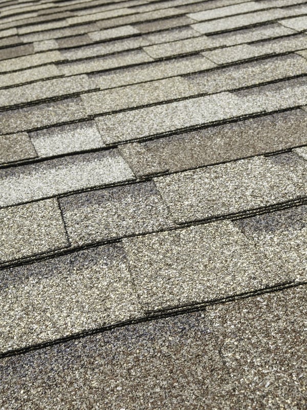 Up on the Roof: Why Roofing Shingles Feel Like Sandpaper